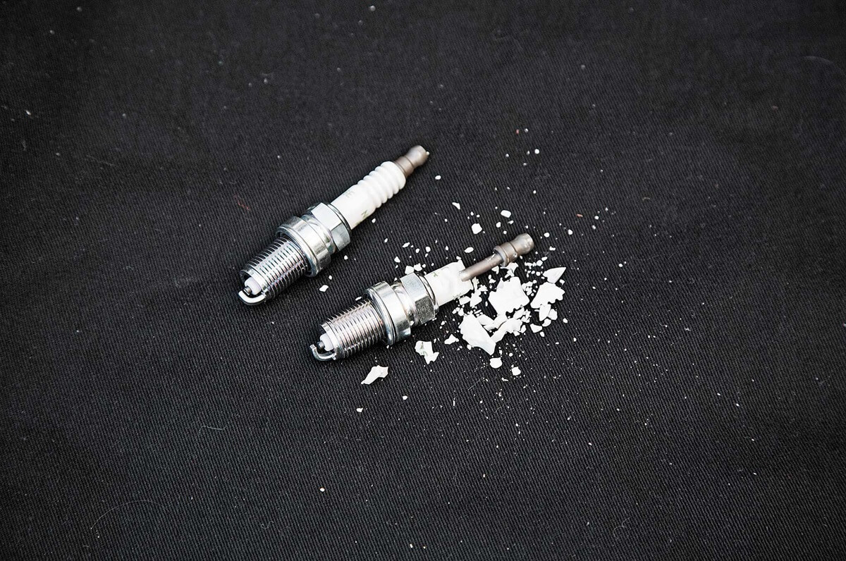 Why Does A Spark Plug Break Glass